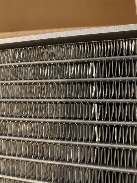 Should I return this new radiator due to the amount of bent fins?? I ...