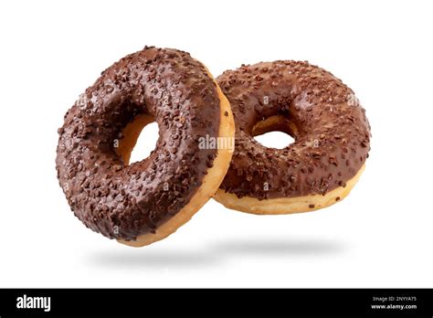 Donuts Or Doughnuts With Icing And Chocolate Praline Isolated On White