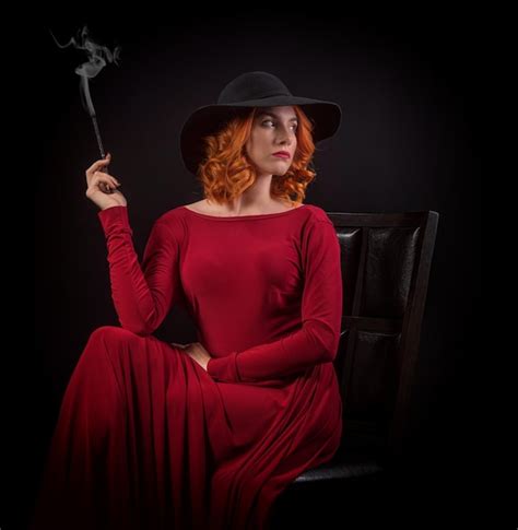 Premium Photo Smoking Woman In Red Dress