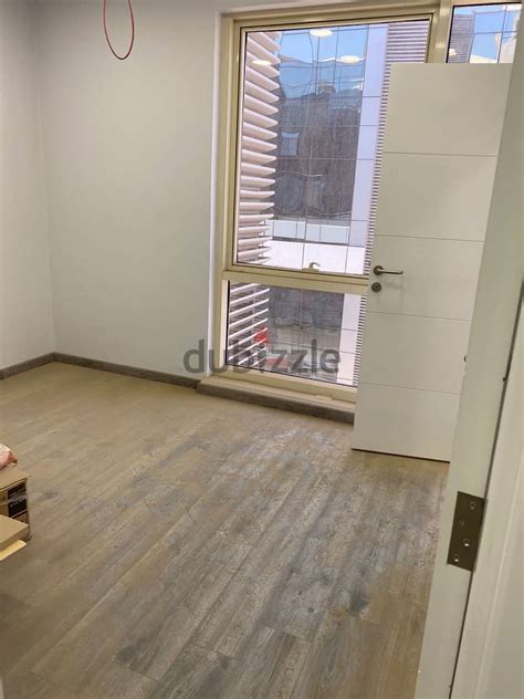 عياده ايجار 60 متر متشطبة بالتكييفات في توين تاور الشيخ زايد عقار