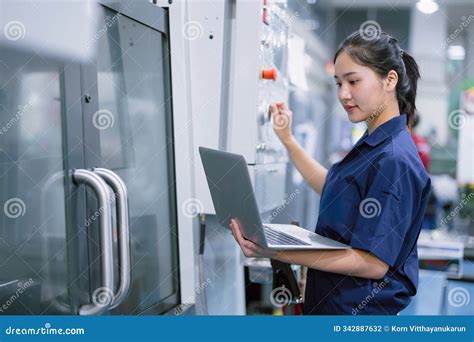 Young Technician Engineer Worker Women Working With Cnc Lathe Metal