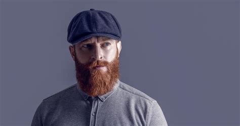 Premium Photo Portrait Of Irish Guy Isolated On Grey Bearded Guy With Serious Face Unshaven