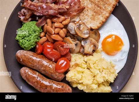 Full English Breakfast With Eggs Sausages Potato Beans Bacon