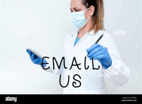 Hand Writing Sign Email Us Business Overview Sending A Commercial Message To A Group Of Showing