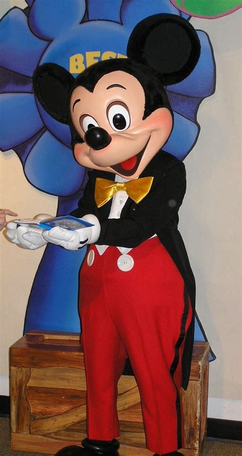 Mickey Mouse In His Tuxedo Signing Autographs Adventures By Disney