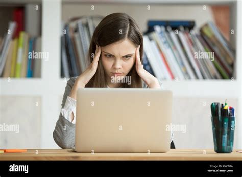 Focused Concerned Student Learning Difficult Homework Assignment With