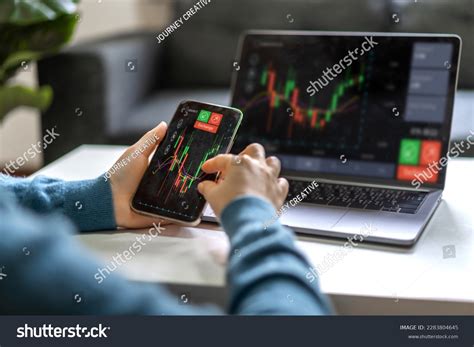 Successful Trader Use Smartphone Laptop TradingẢnh Có Sẵn2283804645 Shutterstock
