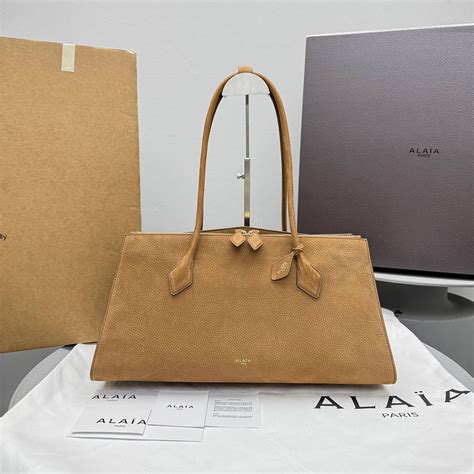 Alaia Le Teckel East West Medium Nubuck Bag Vlixco Goods