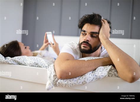 Man Mobile Ignoring Woman Hi Res Stock Photography And Images Alamy