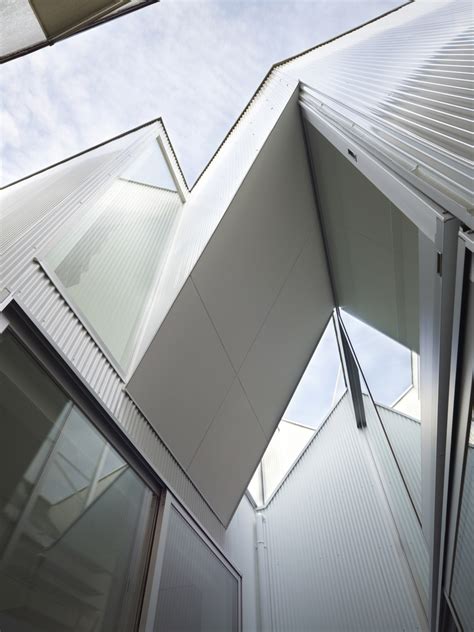 Alphavilles Slice Of The City Is A House Carved Into Two Halves
