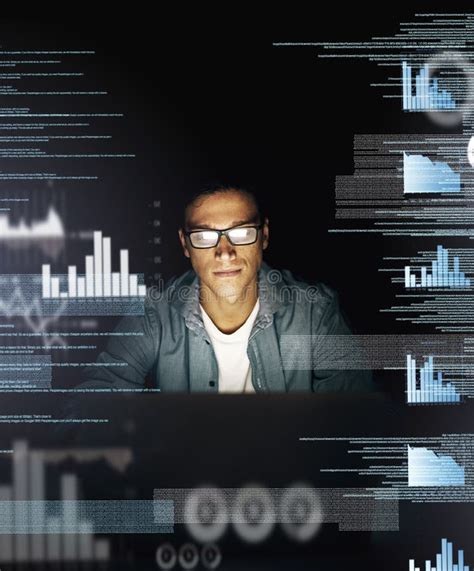 Im All About Cracking Codes A Young Computer Programmer Looking Through Data In The Dark Stock