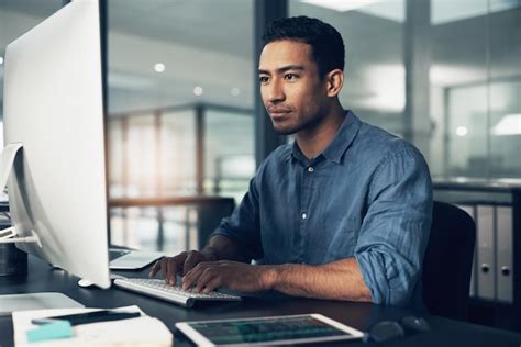 Premium Photo Typing Man And Programmer On Computer In Office At
