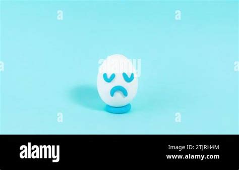 4k An Egg With A Sad Expression Is Gradually Eaten The Concept Of A Losing Life Position Of A