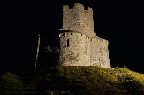 The Historic Church Of St Nicholas Is Located On Top Of A Grassy Hill
