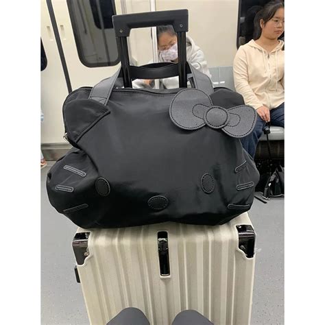 대용량 헬로 키티 단거리 여행 가방 여성 2024 새로운 나일론 휴대용 올 매치 통근 어깨 큰 가방 위시버킷