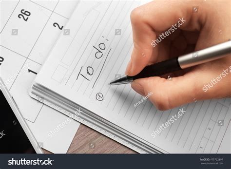 Female Hand Writing Do List Notebook Stock Photo 475732807 Shutterstock
