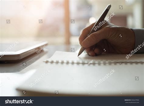 Man Writing On Notepad Paper Notebook Stock Photo 503227993 Shutterstock