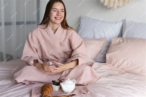 Free Photo Woman In Robe Having Breakfast In Bed
