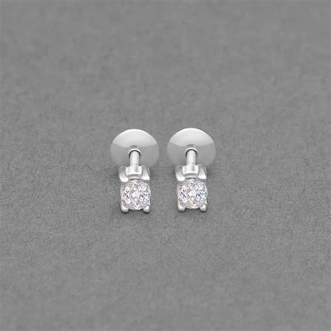 Sterling Silver Rhodium Plated Earrings With Natural Diamonds