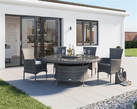 4 Rattan Garden Chairs And Large Round Dining Table Set In Grey