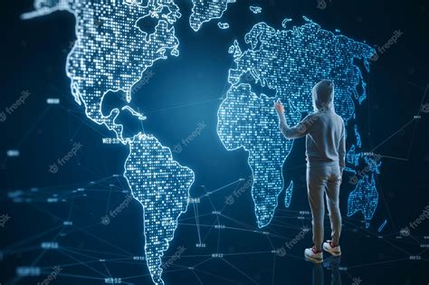 Premium Photo Hacker In Hoodie Using Glowing Pixel Map Hologram On Blurry Blue Background