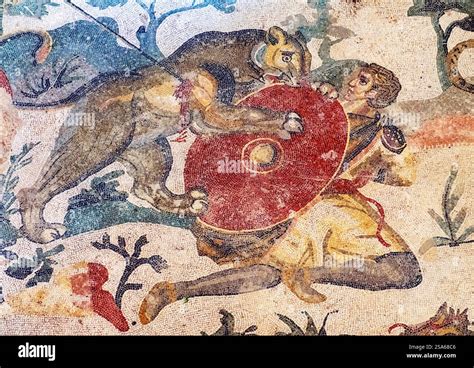 A Lioness Attacks A Hunter Depicted In The Great Hunt Roman Mosaic
