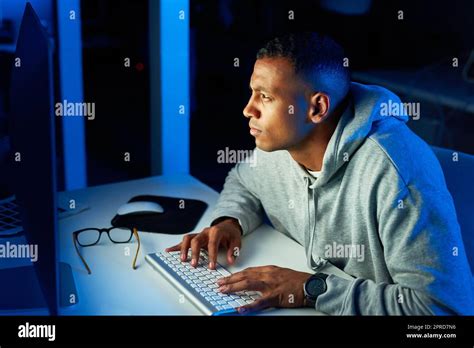 Hes Got His Eyes On His Next Victim A Young Male Hacker Cracking A