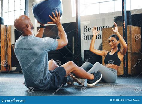 Fitness Personal Trainer And Exercise With Medicine Ball Sit Ups And