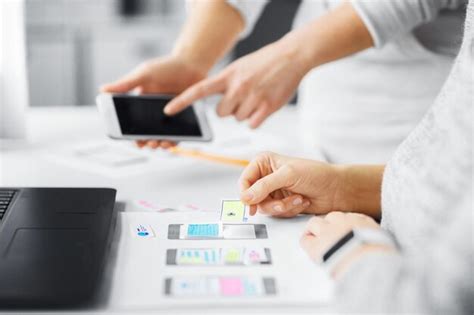 Premium Photo Web Designers Creating Mobile User Interface