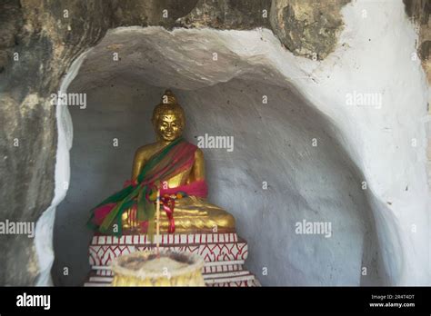 The Golden Sitting Buddha On A Cave At Wat Pra Pathom Jedi Is A Largest