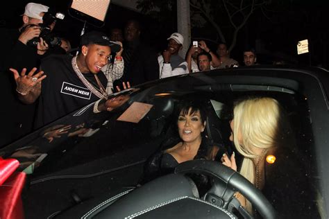 Tyga Ts Kylie Jenner With A Brand New Ferrari At Bootsy Bellows For