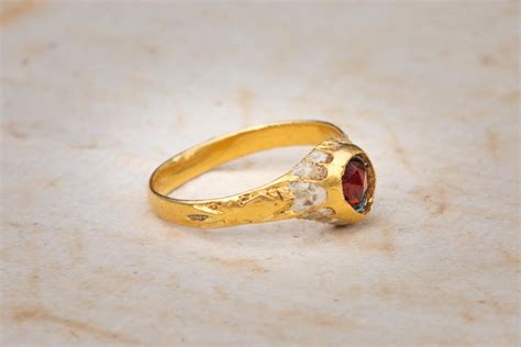 Renaissance Early 17th Century Enamelled 22k Gold Rose Cut Garnet Ring