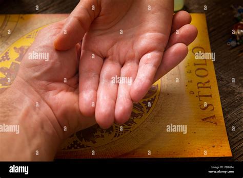 Foretelling The Future Through The Study Of The Palm And Astrology Stock Photo Alamy