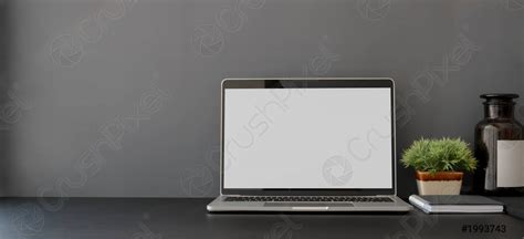 Open Blank Screen Laptop Computer In Dark Trendy Workplace With Stock Photo 1993743 Crushpixel