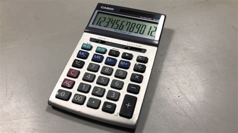 電卓のキーをメンテナンス＆電池ブタ製作 プログラマ ずんべ の日記 Ⅱ