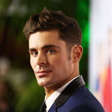 Zac Efron Yolo Tattoo Meaning Zac Efron Shows Off His Touched Up