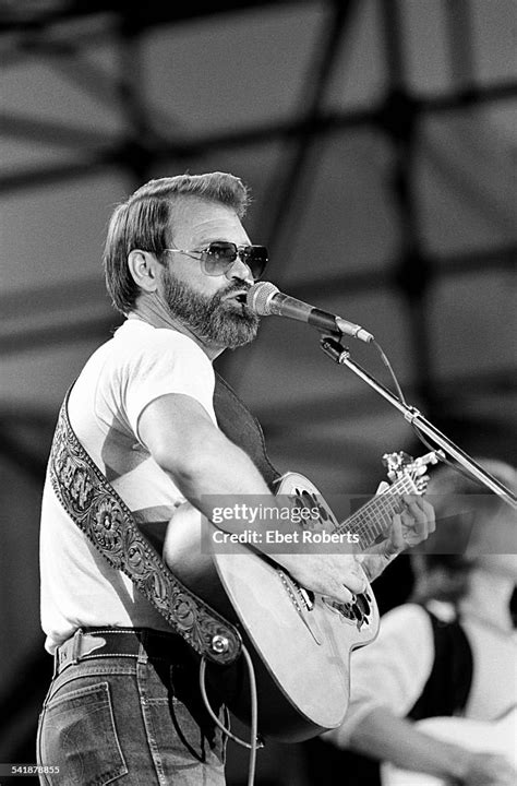 Glen Campbell Performing At Farm Aid In Champaign Illinois On News