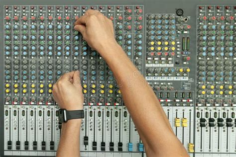 Male Sound Engineer Hands Working On Audio Mixing Console Stock Image
