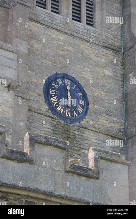 one handed clock on all saints church ellington cambridgeshire stock