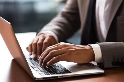 Premium Photo A Person Typing On A Laptop With A Black Keyboard