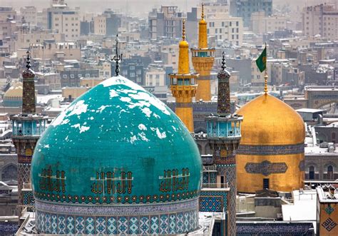 تصویر باکیفیت گنبد حرم امام رضا برفی