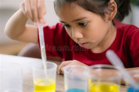 Asian Girl Doing Chemical Experiments At The Lab Stock Photo Image Of Scientist Analysis
