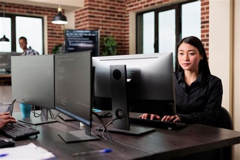 Premium Photo Cybernetics Engineer Writing Lines Of Code In Order To Secure Mainframe Database