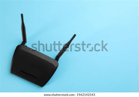 Modern Wifi Router On Light Blue Stock Photo Shutterstock