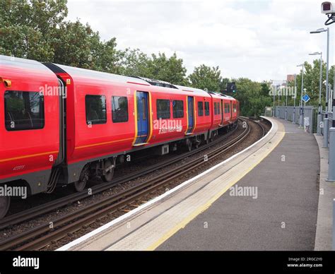 Two Class 707 Electric Multiple Units At Hampton Wick Station In London