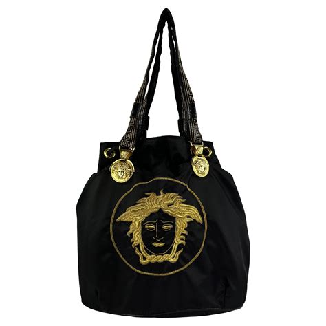 1990s Gianni Versace Black Nylon Medusa Embroidered Drawstring Tote For