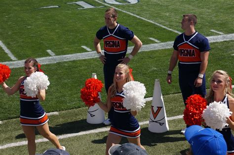 The University Of Virginia Cheerleaders Cheering On The Ca… Flickr