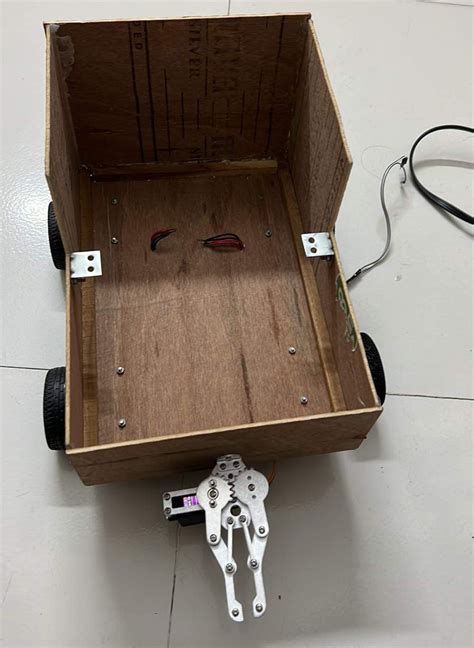 Arduino Bluetooth Controlled Robot Using L N And MG Servo Motored Mechanical Arm Shojib
