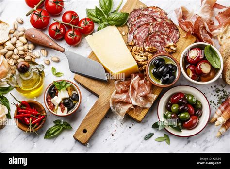 Italian Snacks Food With Ham Sliced Bread Ciabatta Olives Parmesan