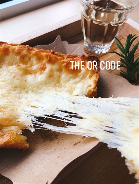 The Qr Code หนาวๆ แบบนี้ ยืด ยืด อุ่น อุ่น สักที่มั้ยคะ ขนมปังชีส ร้านกาแฟเล็กๆ Theqrcode